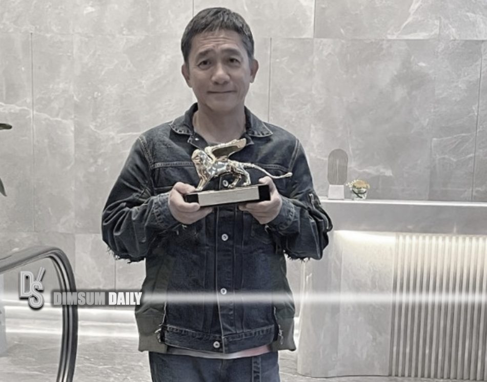 HK actor Tony Leung flaunts his Golden Lion Lifetime Achievement Award trophy upon arrival at ...