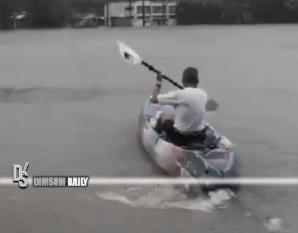 Severe flooding engulfs Hong Kong Police College, man spotted paddling ...