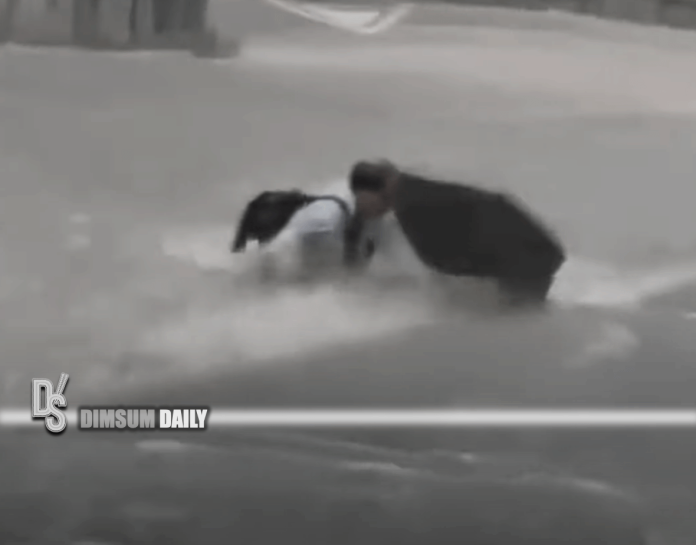 Video showing man in office wear swept away by floodwaters in Kowloon ...