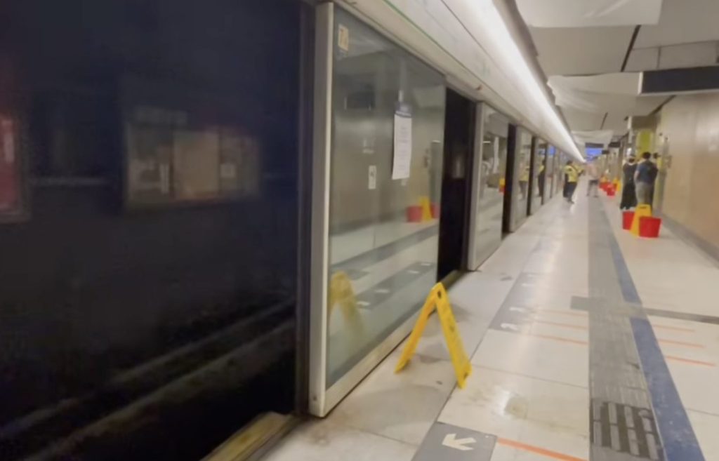 Post-storm scene at MTR Wong Tai Sin Station, dripping ceilings and ...