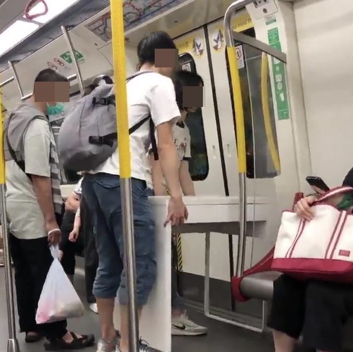 Viral video of man and woman transporting table on MTR train sparks ...