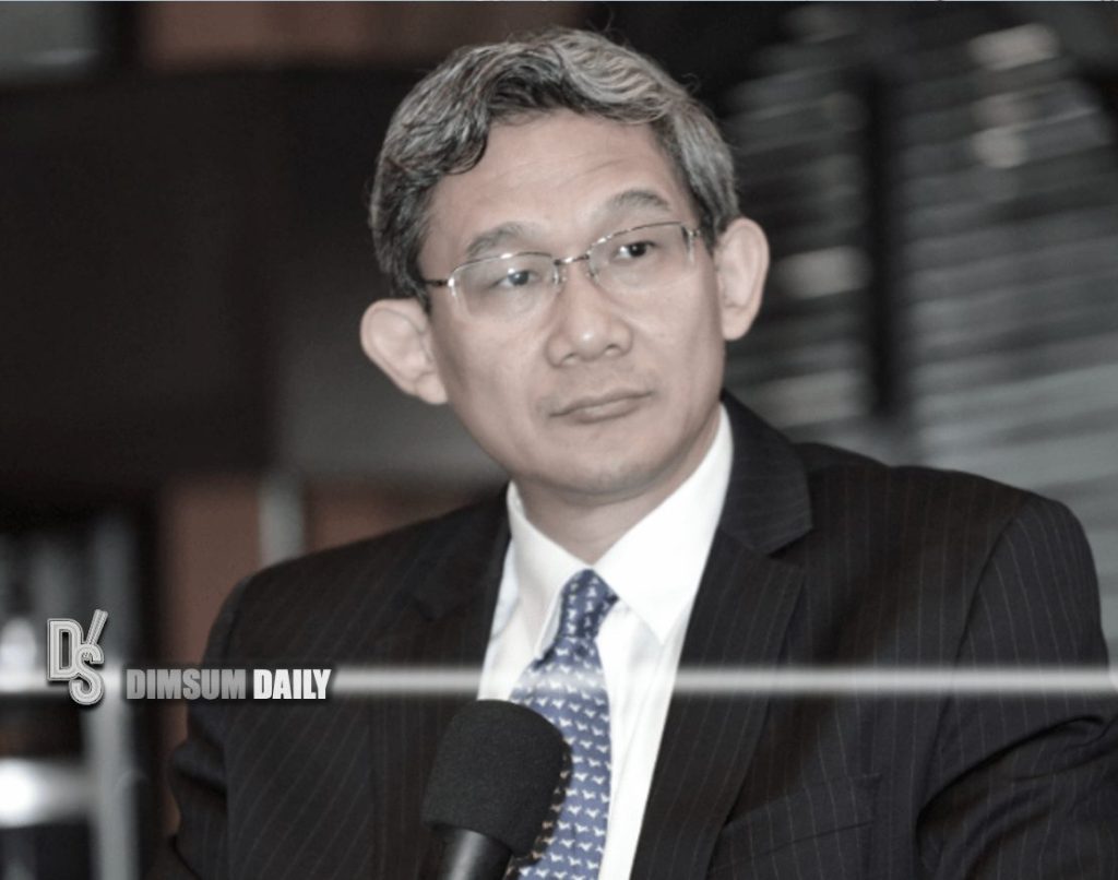 Nomura banker barred from leaving China as investigation into deal ...