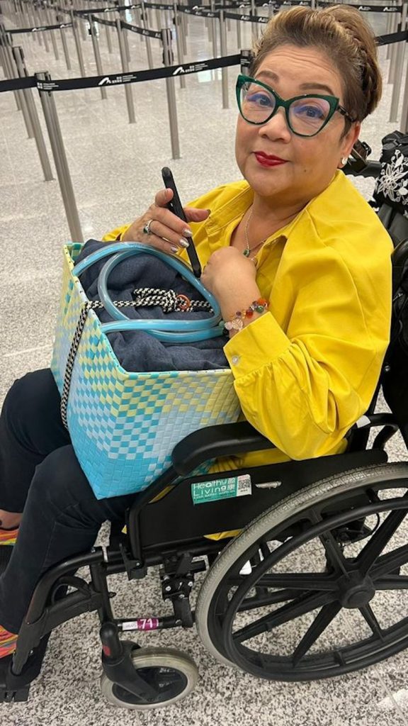 69-year-old local singer and host Maria Cordero appears in a wheelchair ...