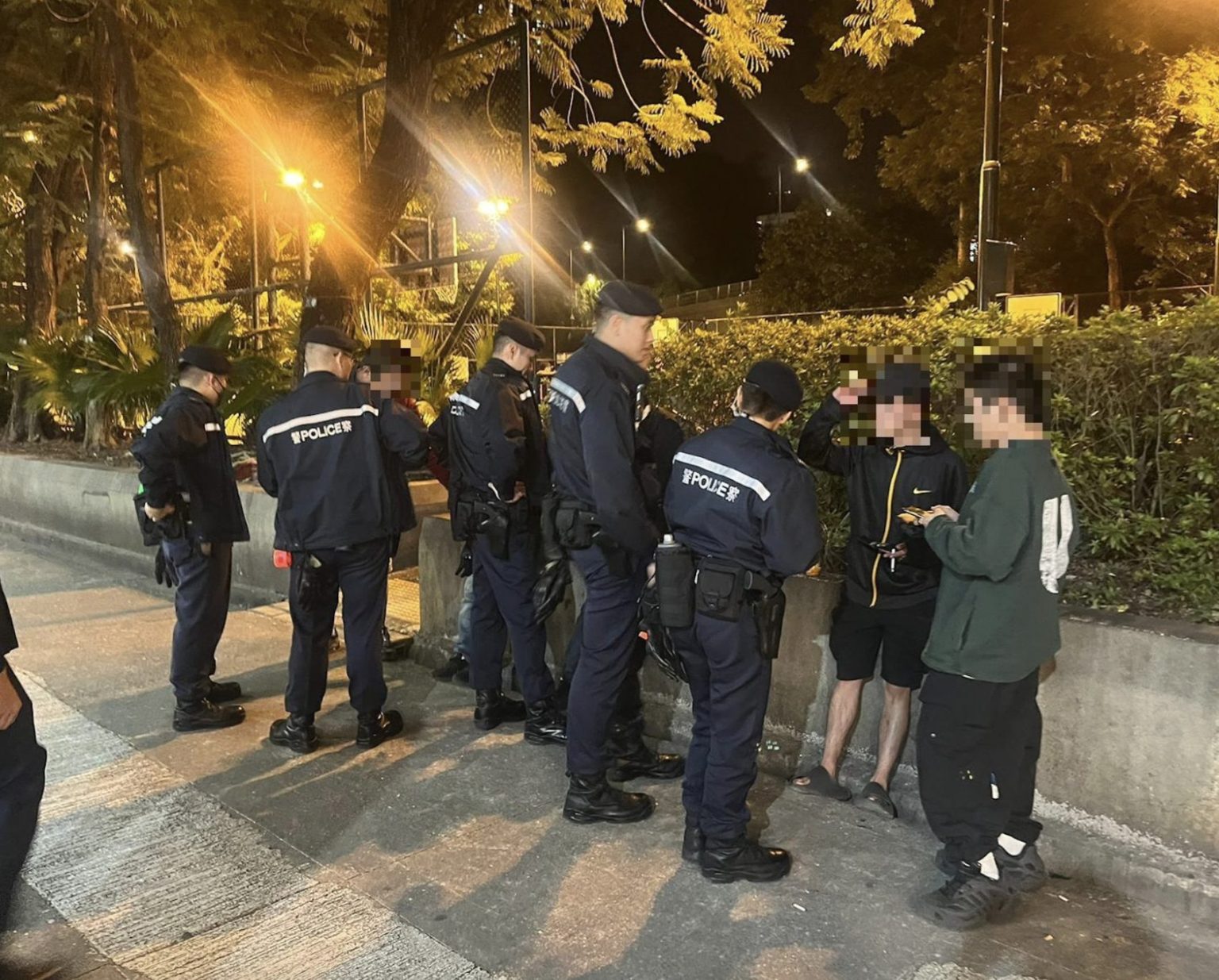 Police crack down on triad gangs, arresting 98 individuals, including a ...