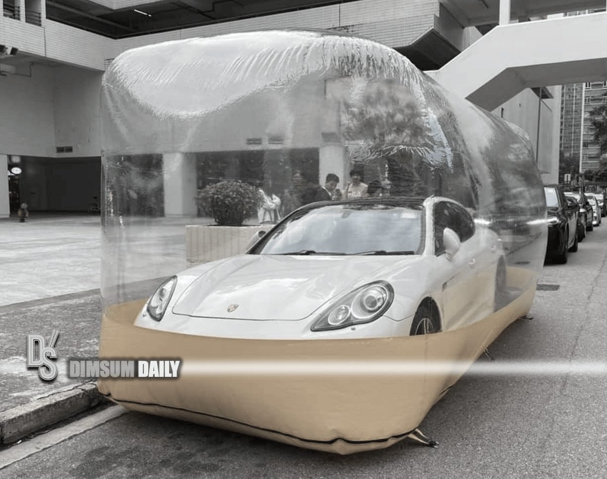 Porsche shielded by inflatable cover thwarts parking enforcement in ...