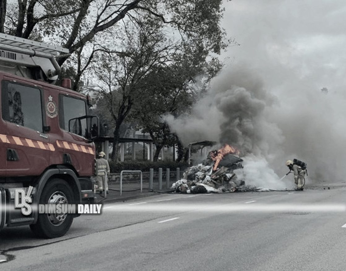 Garbage truck catches fire in Yuen Long as firefighters swiftly ...
