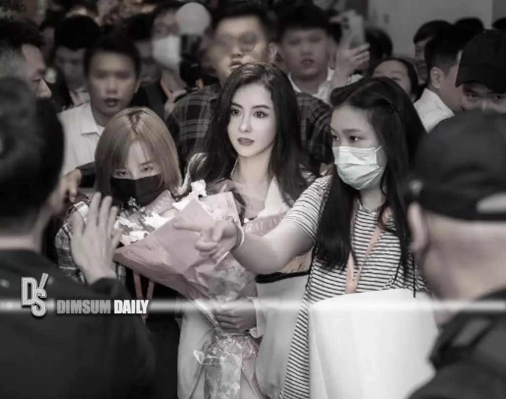 43-year-old Hong Kong actress Cecelia Cheung surrounded by enthusiastic ...