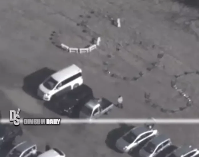 Massive "SOS" signal built by citizens in Ishikawa Prefecture parking ...