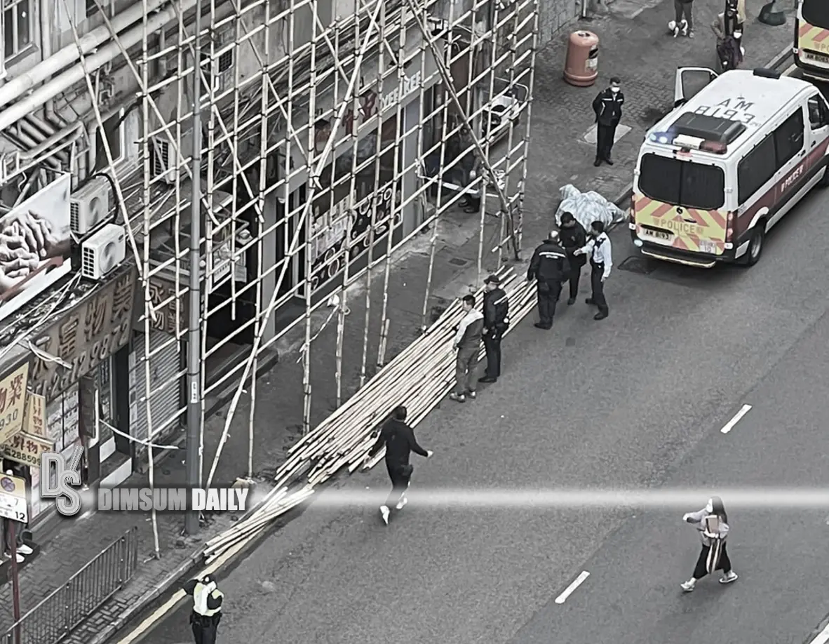 Construction worker hospitalised after falling from Lai Wan Building in ...