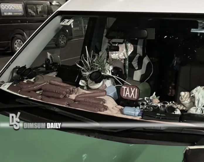Sausages on taxi dashboard delight and puzzle netizens - Dimsum Daily