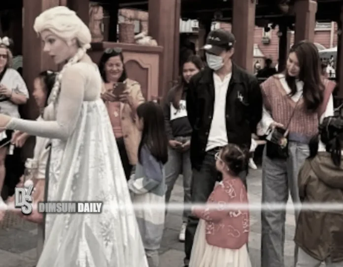 HK actor Raymond Lam spotted at Disneyland with family, daughter's rare ...