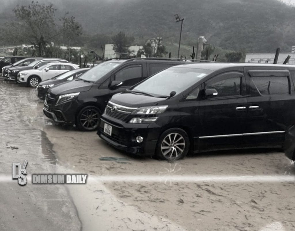 Car owners helplessly arrange towing as vehicles submerge and engines fail in flooded parking ...