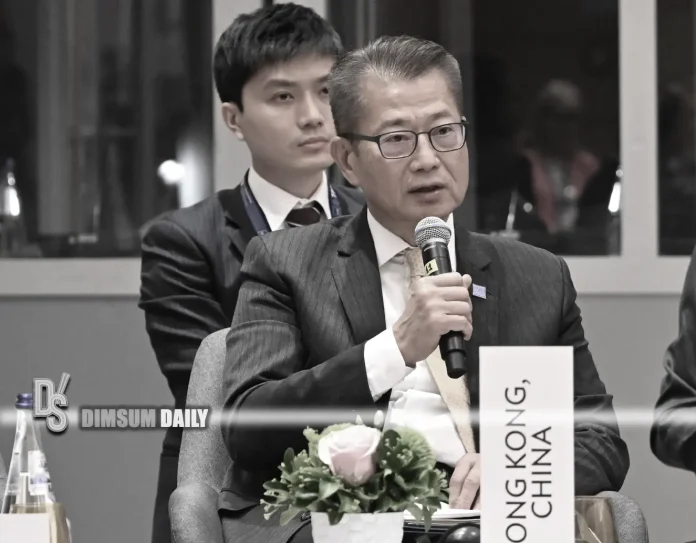 Financial Secretary, Paul Chan, engages in discussions on economic ...