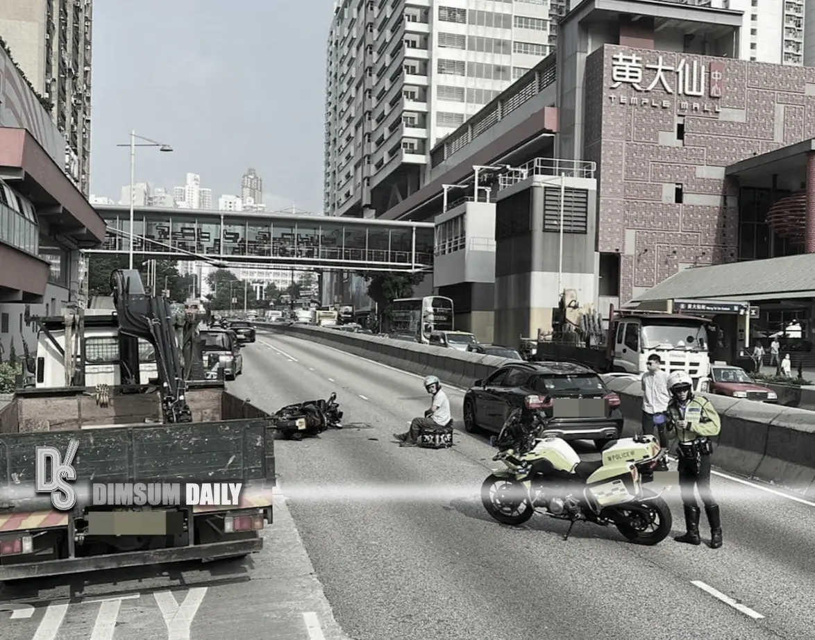 Private car and motorcycle collide on Lung Cheung Road