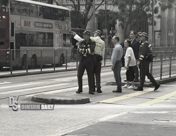 Crack down on jaywalking during lunch hour in Central, white-collar ...