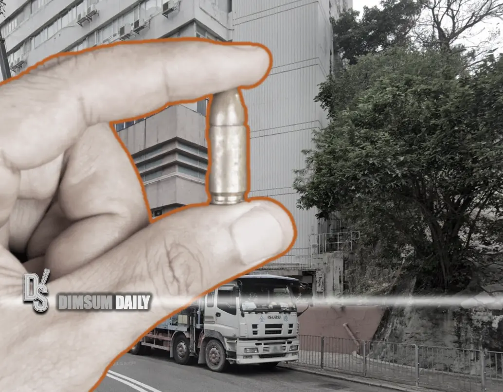 Police officers arrest individual and seize suspected 9mm bullet in ...