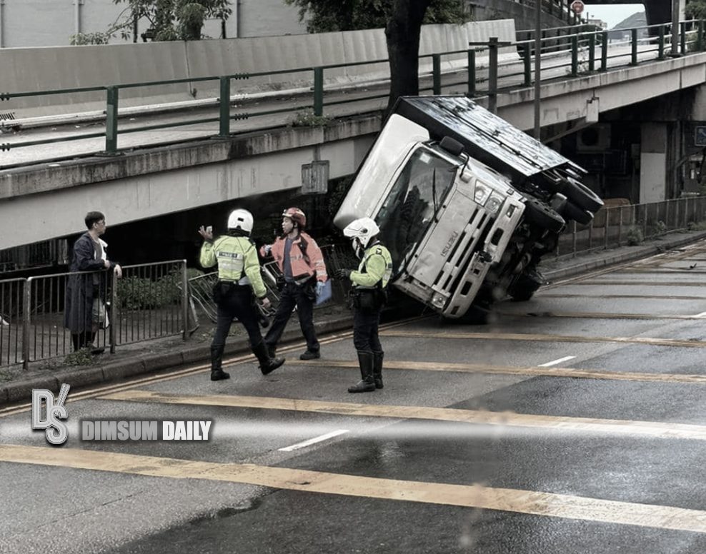 Cargo truck loses control at Hung Hom Tunnel entrance, crashes into ...