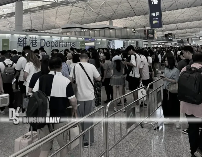 Long queues form at airport departure hall as Microsoft system crashes, check-in counters ...