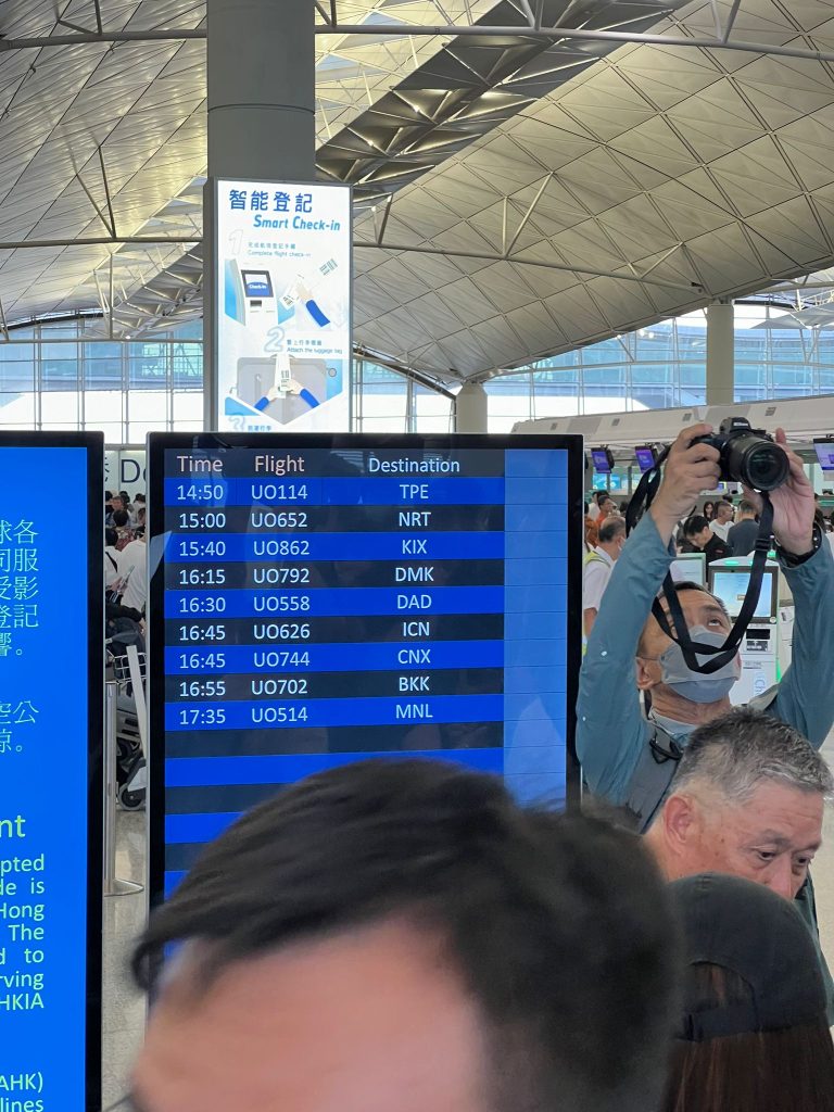 Long queues form at airport departure hall as Microsoft system crashes ...
