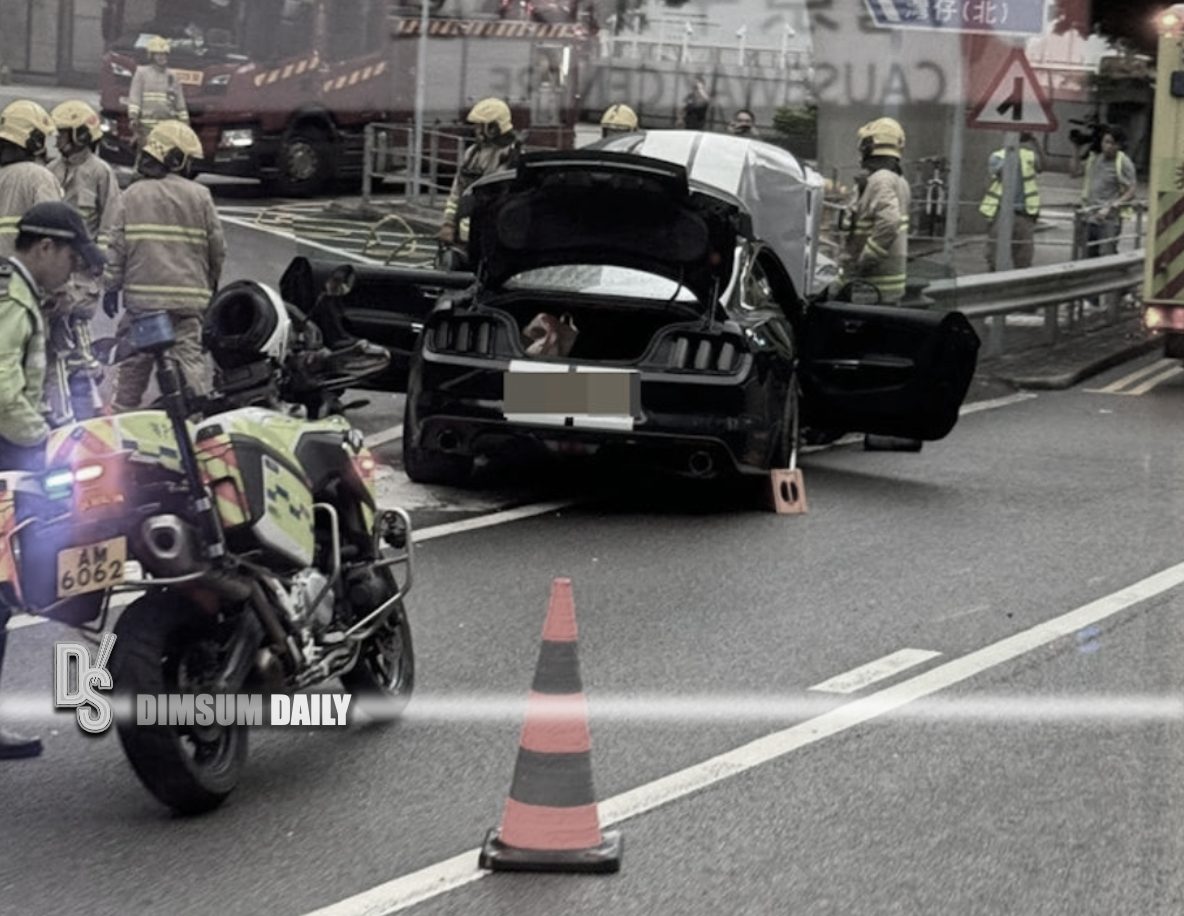 Ford Mustang crashes into road barrier on Harcourt Road, driver missing