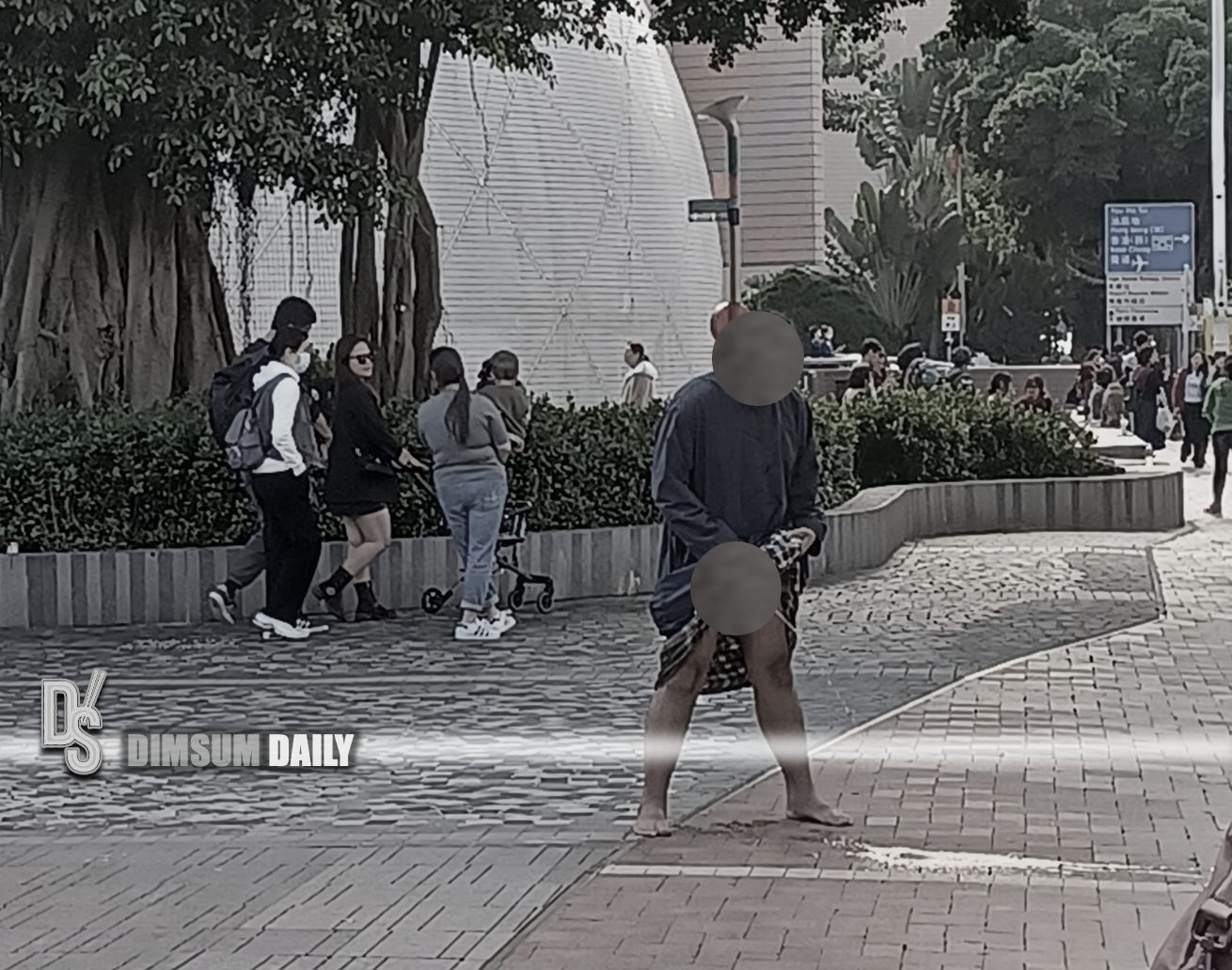 Man urinating in TST-1-1 - Dimsum Daily