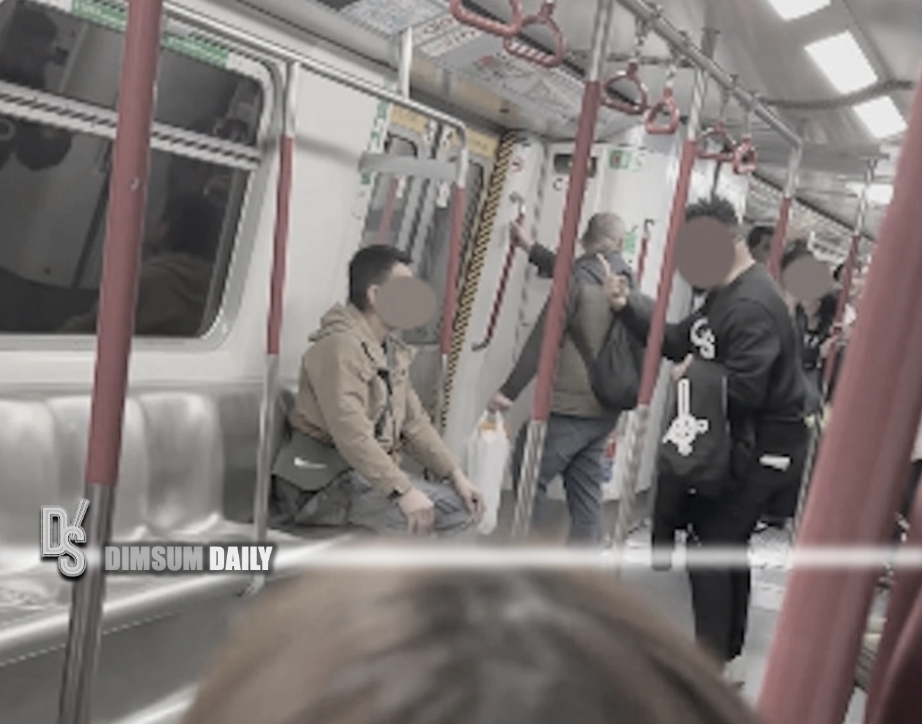 Foreign man verbally assaults local passenger on MTR train