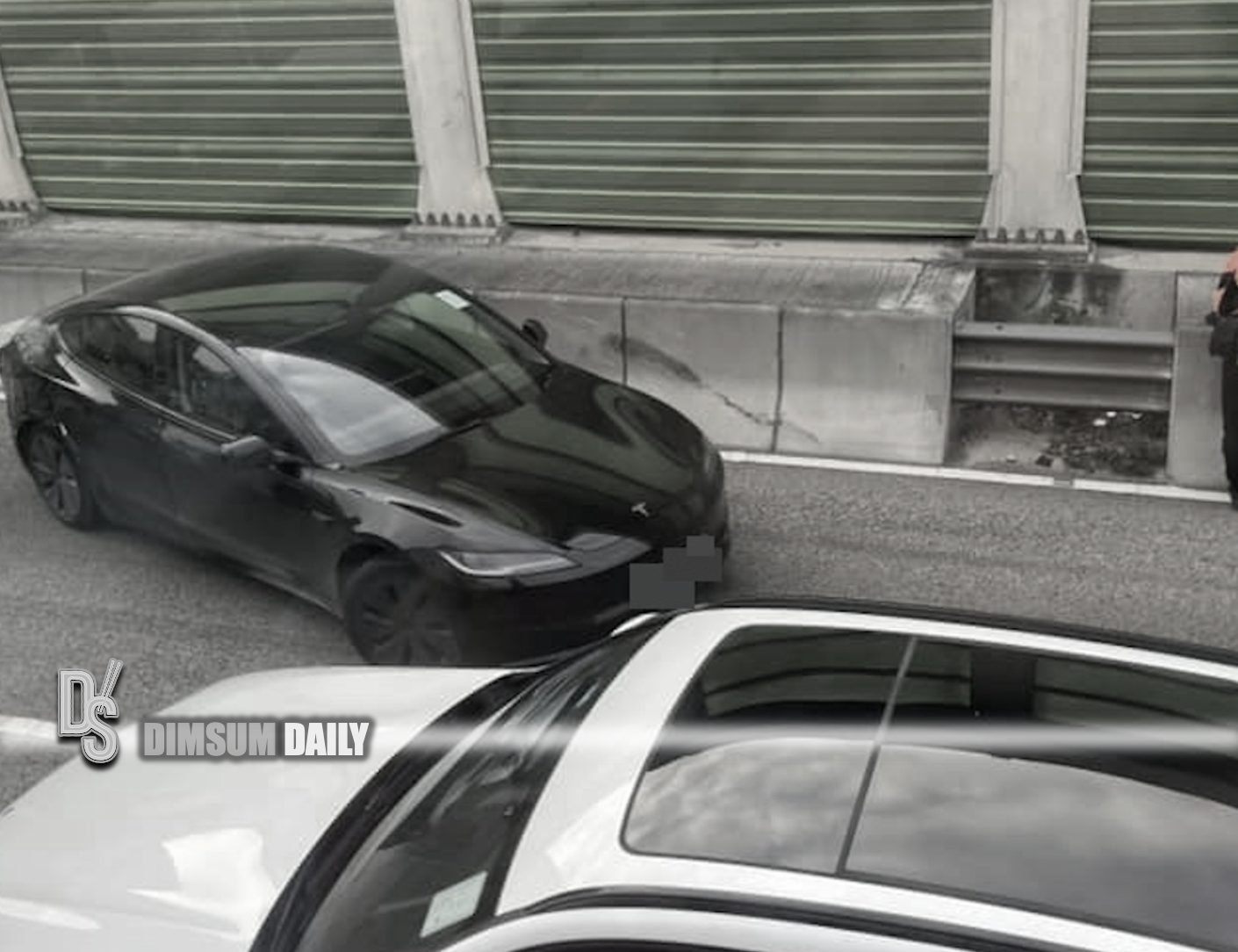 Traffic collision involving Tesla and truck on Tuen Mun Road leaves one ...