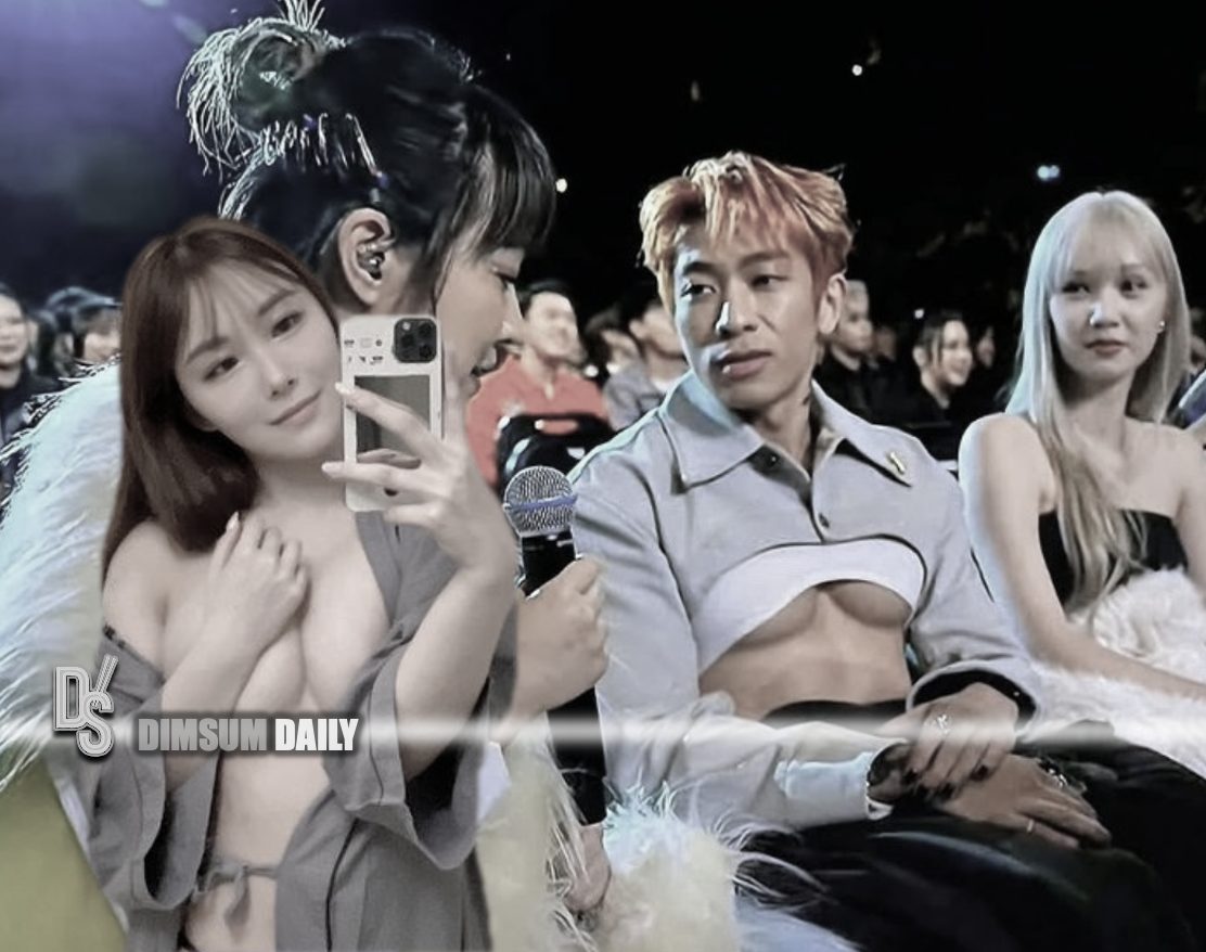 HK adult film actress Erena So embraces Tyson Yoshi's cringey style to display half her breasts