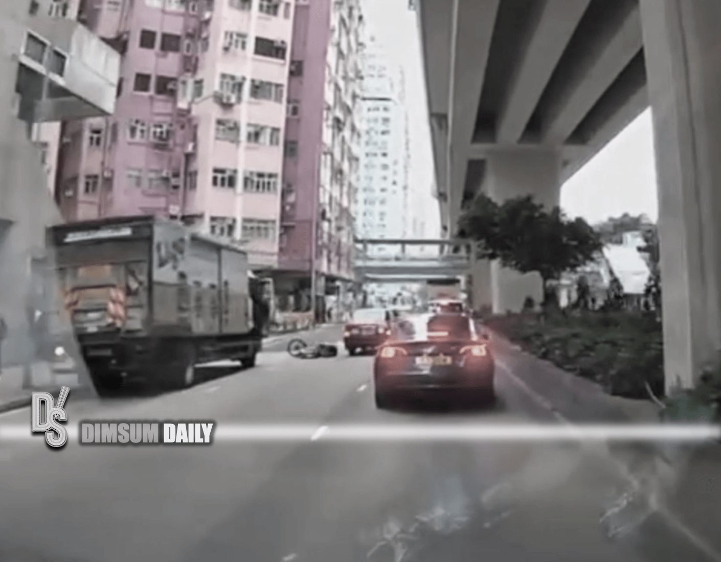 Near miss in Mong Kok as cyclist falls after van door opens unexpectedly