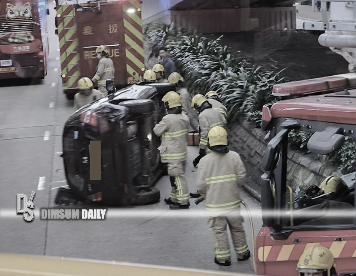 Driver escapes unharmed after car overturns in Sai Yee Street accident