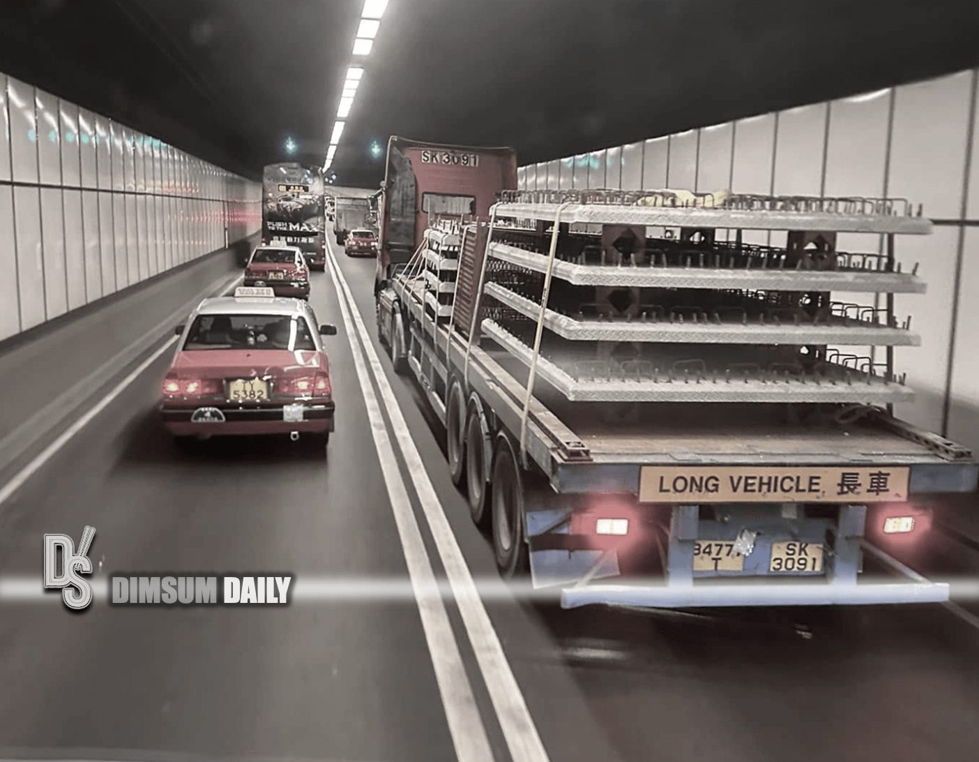 Truck collision at Eastern Harbour Crossing damages booth and barriers