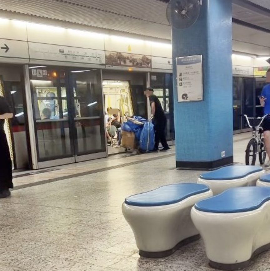 Viral video shows passengers pushing overloaded trolleys onto MTR train ...