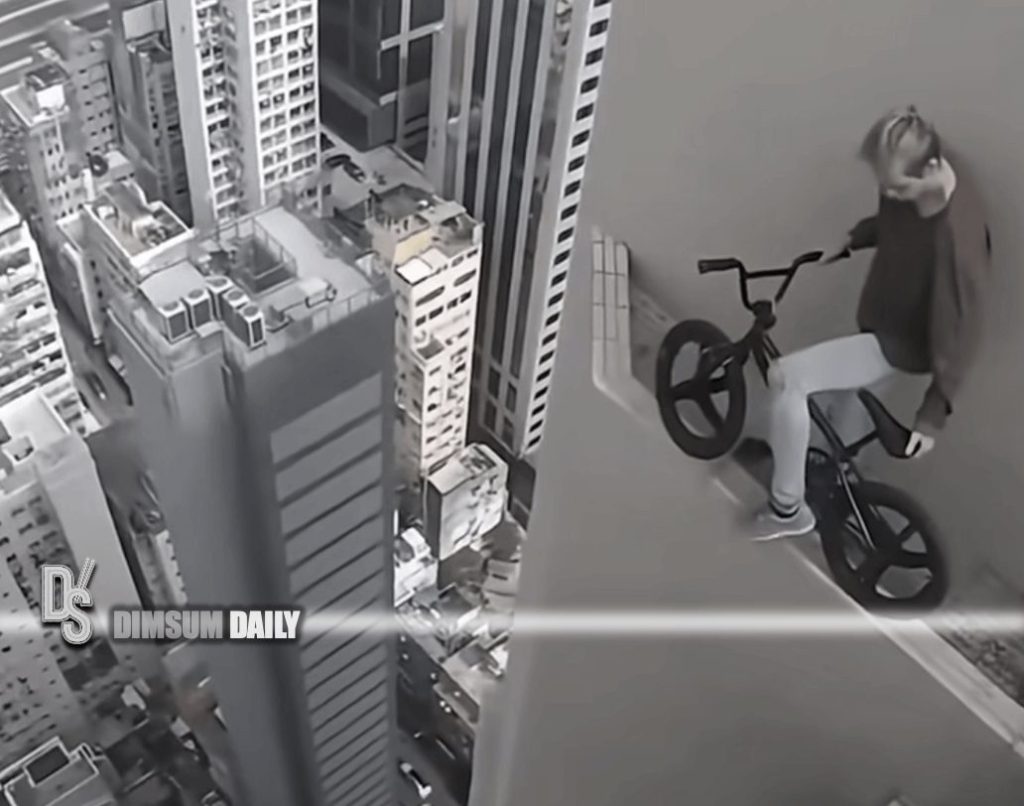 Daredevil cyclist’s high-rise stunt in Hong Kong sparks online backlash