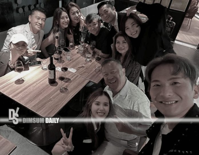 Awkward moment as Eris Tang kneels between Eric Tsang's legs at ...