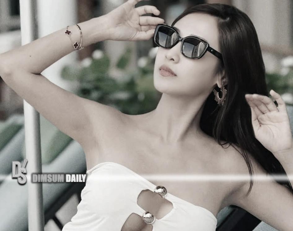 Connie Lam stuns in beige HK$35 cut-out swimsuit