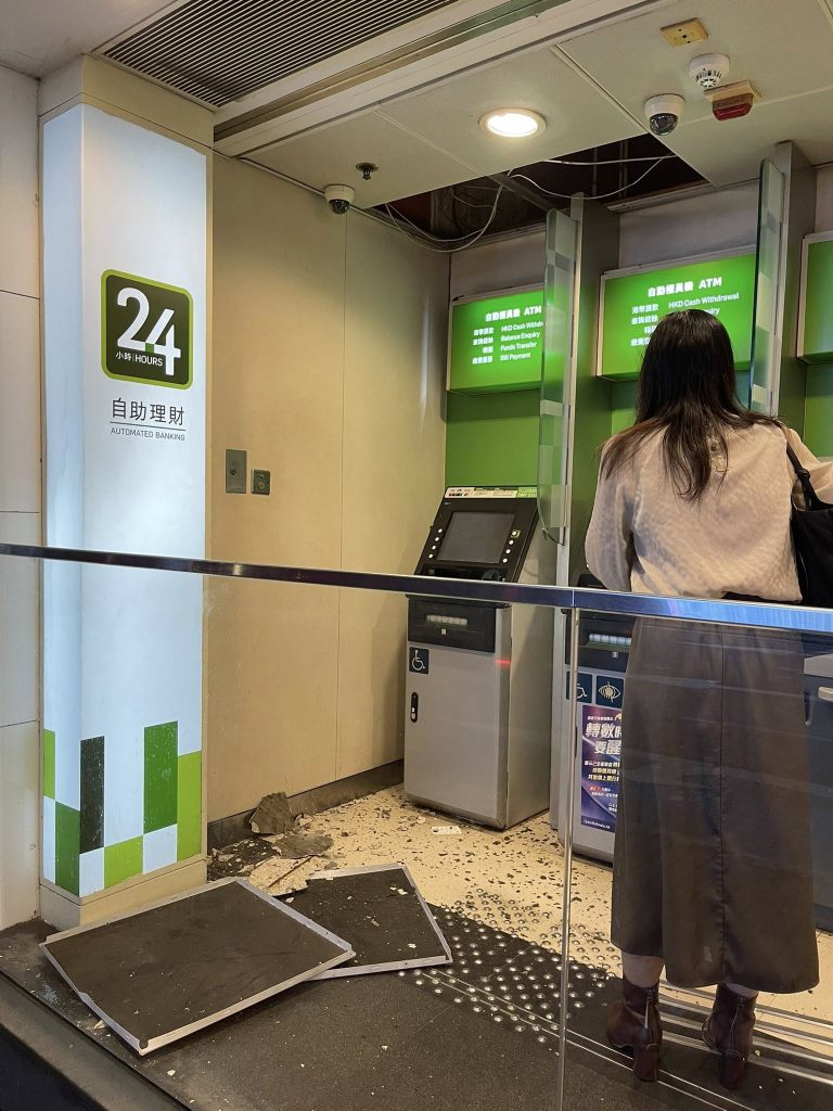 Police cordon off scene after ceiling collapse at Hang Seng Bank ATM area in Kennedy Town