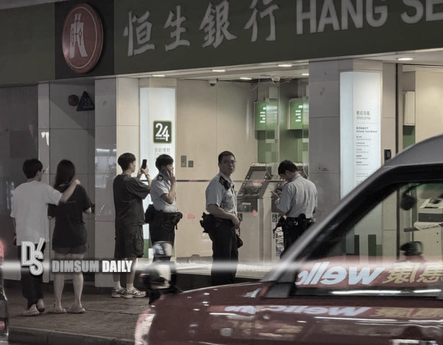 Police cordon off scene after ceiling collapse at Hang Seng Bank ATM ...