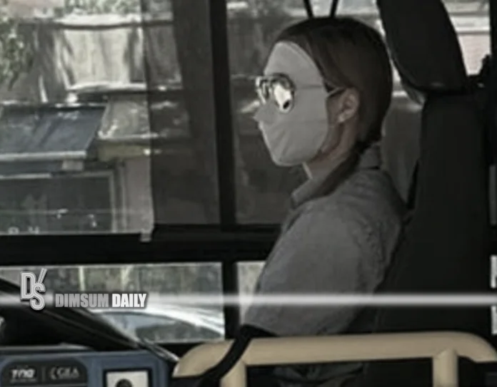 Female Citybus driver spotted wearing full-face mask and sunglasses