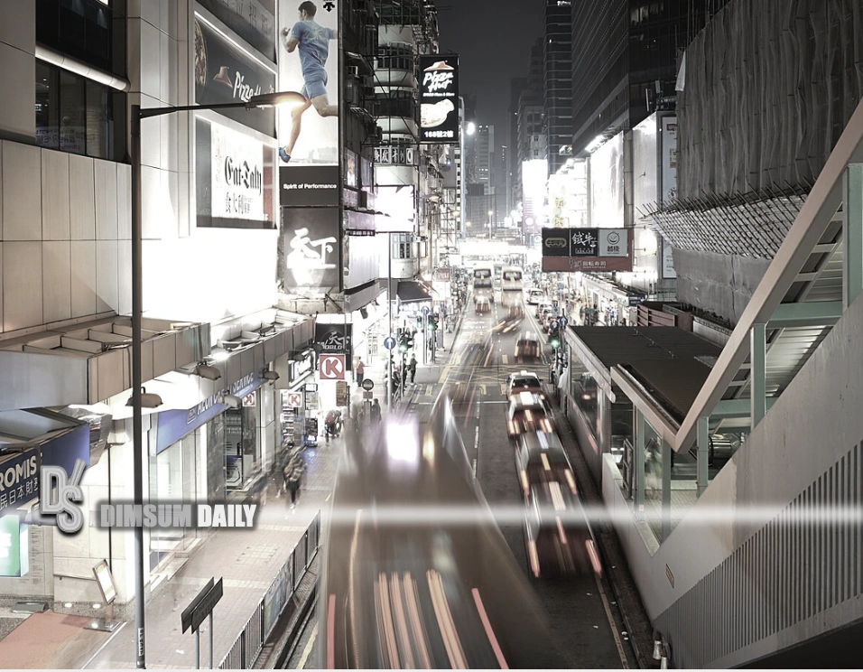 Young men leap over crouching children in Mong Kok walkway stunt