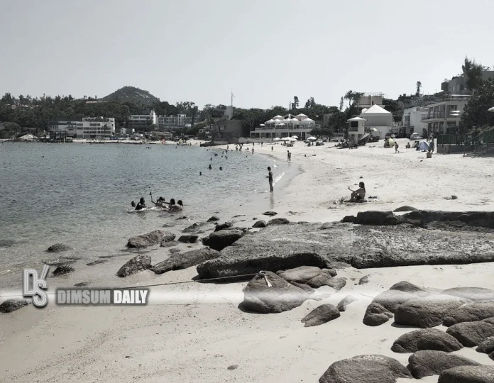 Middle-aged male swimmer at Stanley Main Beach dies after suspected ...