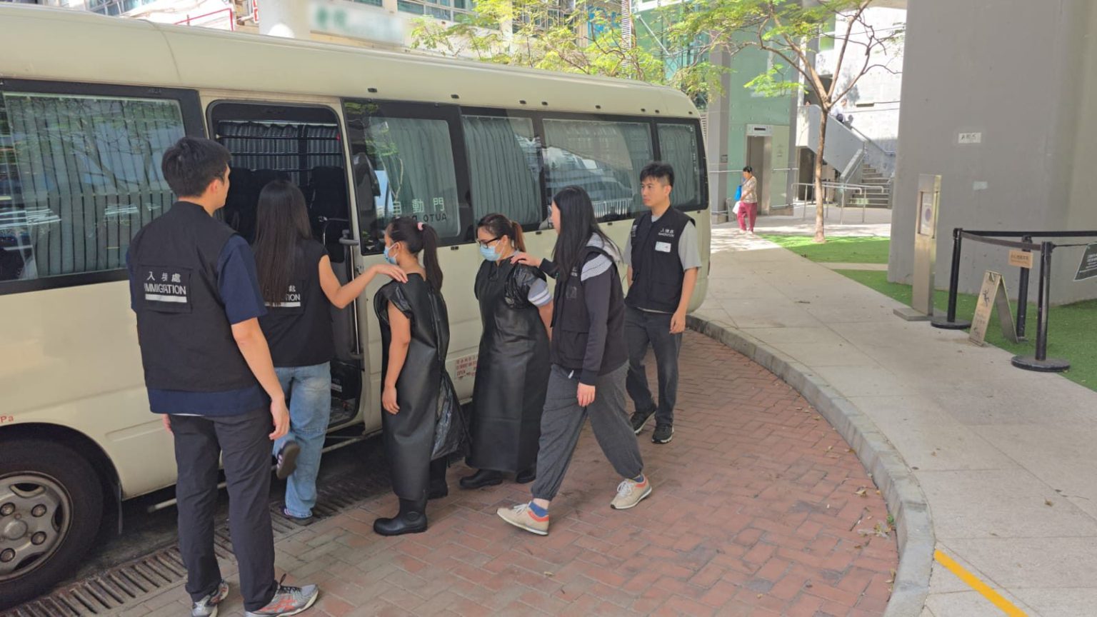 Immigration arrests 21 in illegal work raid, including two domestic ...