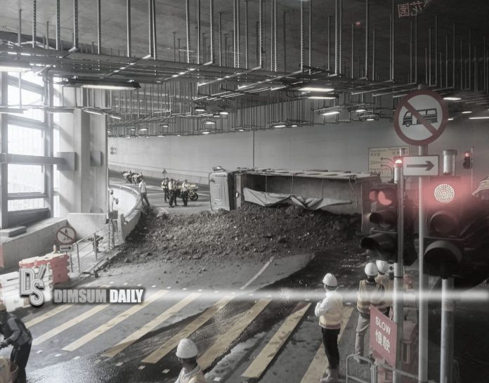 Tipper truck overturns on Hoi Wang Road, debris spills across carriageway