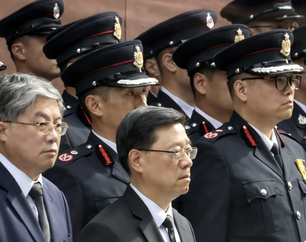 Chief Executive John Lee attends highest‑honours funeral for fallen ...