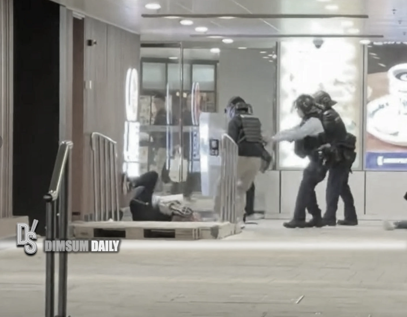 Shoppers flee as suspect grabs cleaver and hostages before police open fire