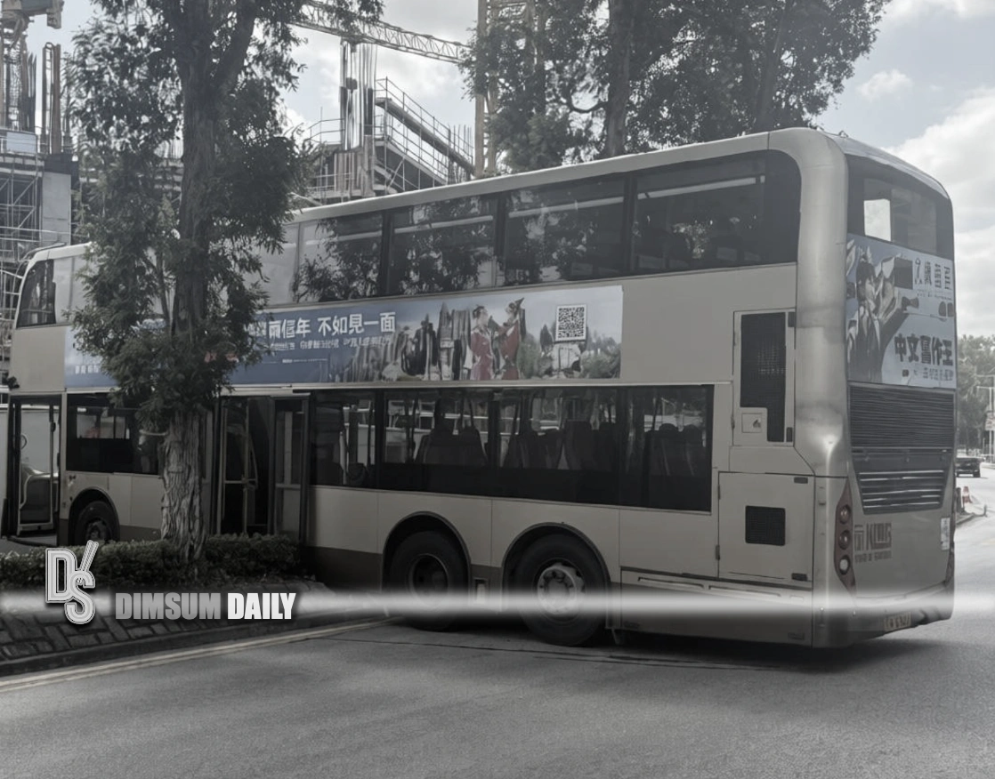 KMB bus mounts pavement in Sheung Shui after missing turn, driver suspended