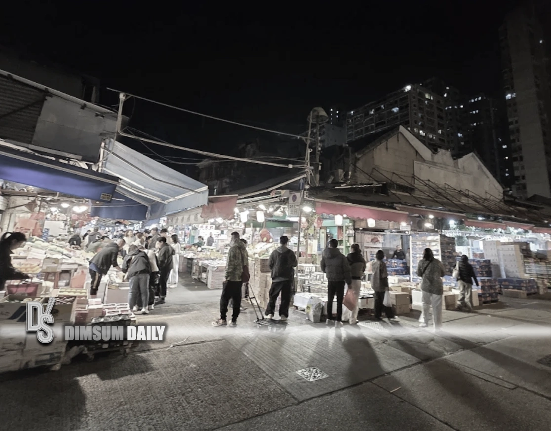 Masked man caught on CCTV splashing paint on Yau Ma Tei Wholesale Fruit ...
