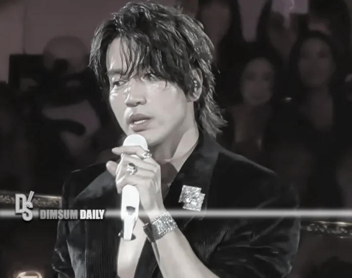 Jerry Yan's stage lift tilts mid-performance, gripping handrail to stay ...