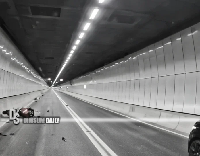 Motorcyclist thrown 15 metres in Lung Shan Tunnel crash